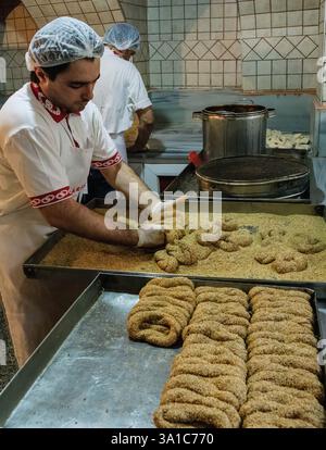 Istanbul, Turkey, Turkiye. Baker Rolling Simit, Traditional Turkish ...