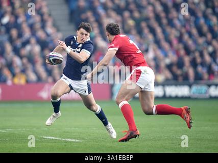 Scotland's Tom Jordan tackled by Wales's Max Llewellyn during the ...