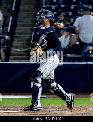 New York Yankees' catcher J.C. Escarra and pitcher Cam Schlittler shake ...