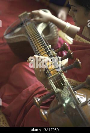 Lady playing veena south Indian musical instrument in religious ...
