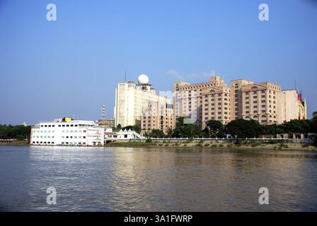 Skyscrapers on bank of Hooghly river ; Calcutta ; West Bengal ; India ...