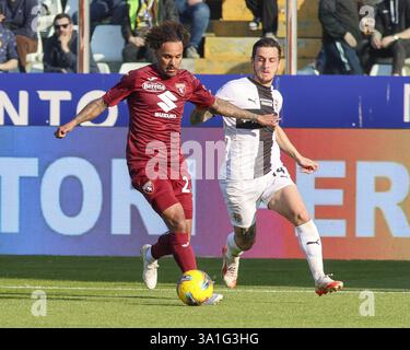 Valentino Lazaro of Torino FC competes for the ball with Francisco ...