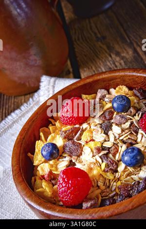 Rustic muesli breakfast with forest fruits Stock Photo - Alamy