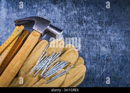 Leather protective working gloves construction nails wooden meter and ...