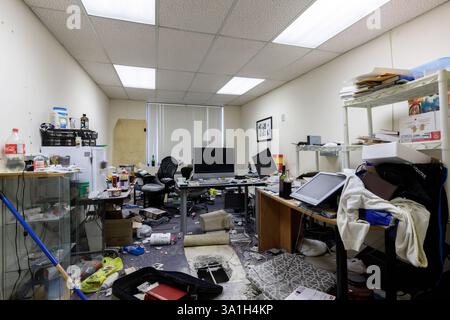 A very messy office in an abandoned office building. This building has ...
