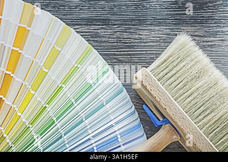 Horizontal view of color palette fan paintbrush on wooden board Stock ...