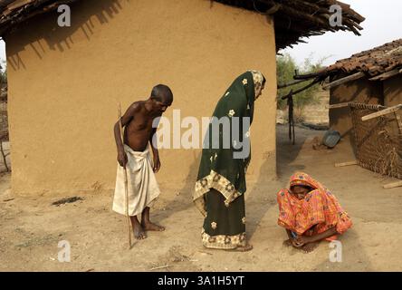 People standing outside hut, Garwa and Latehar, Jharkhand, India, Asia ...