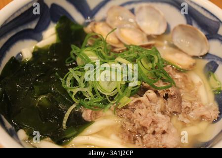 Japanese cuisine: wakame (seaweed) and asari (Manila clam) udon noodles ...