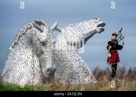 Scotland's National Piper Louise Marshall playing a lament to the ...