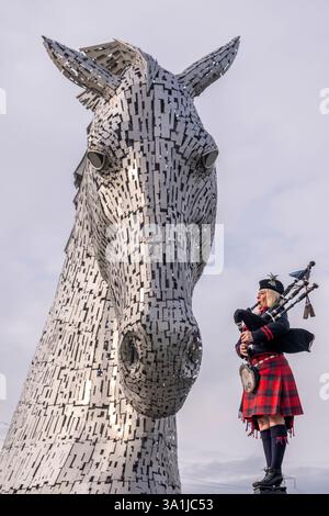 Scotland's National Piper Louise Marshall playing a lament to the ...
