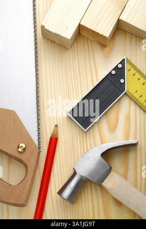 hammer pencil saw level Stock Photo - Alamy