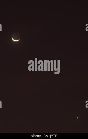bright half moon arranging on sky in night Stock Photo - Alamy