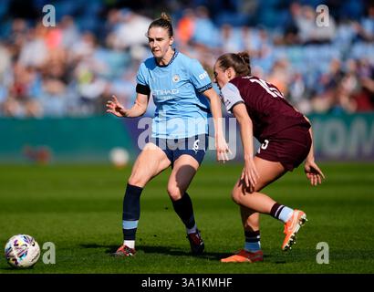 Aston Villa's Lucy Parker (left) and Paula Tomas warm up before the ...