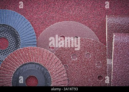 Rolled abrasive paper grinding wheels on polishing sheet Stock Photo ...