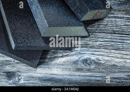 Sanding sponges on vintage wooden board Stock Photo - Alamy