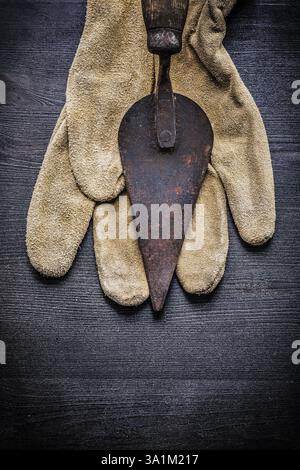 old rusted putty spattle on glove Stock Photo - Alamy