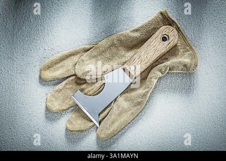 Bricklaying trowel working gloves on concrete background construction ...