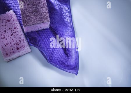New kitchen sponges on white background Stock Photo - Alamy