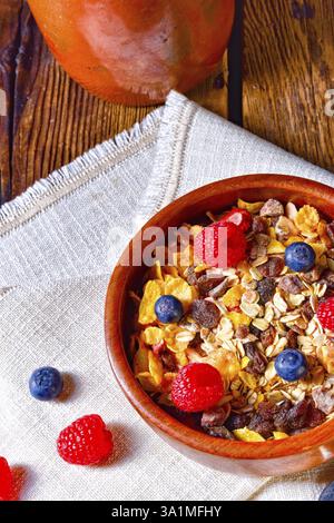 rustic muesli breakfast with forest fruits Stock Photo - Alamy