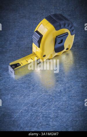 Plastic tape line on scratched vintage metallic background construction ...