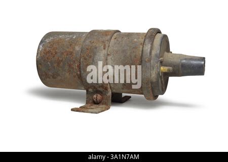 conventional ignition coil in clamp with holes for fixing the coil. old ...