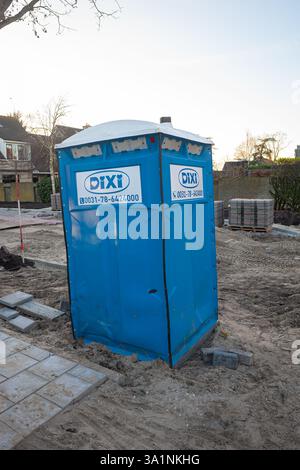 Dixi portable toilet at a construction site. The blue cabin out of ...