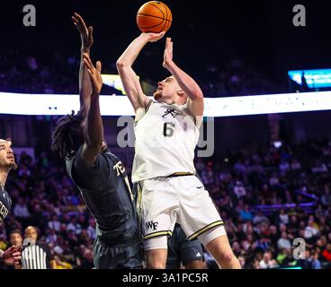 March 8, 2025: Wake Forest forward Omaha Biliew (0) shoots over Wake ...