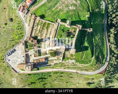Aerial view of Alora medieval hilltop castle ruin with dual walled ...