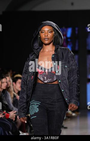 Lisbon, Portugal. 09th Mar, 2025. A model walks the runway during Nuno ...