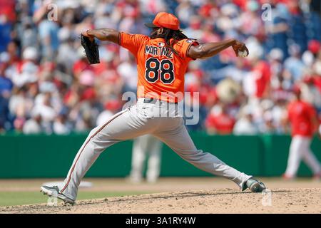 Clearwater, FL: Baltimore Orioles pitcher Riley Cooper (99) delivers a ...
