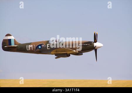 Supermarine Spitfire flying low world war two fighter aircraft Stock ...