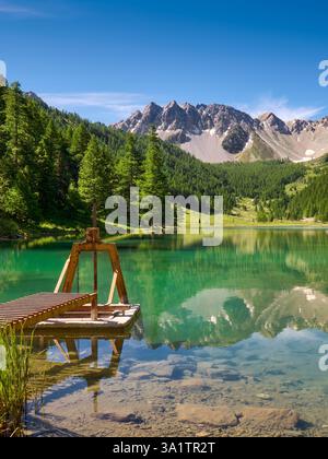 Orceyrette Lake in Summer with larch tree forest. Briancon Region in ...