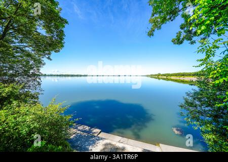 View of the Ismaning reservoir and the surrounding nature. Landscape at ...