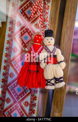 Traditional Bulgarian Martenitsa made of red and white wool, a symbol ...