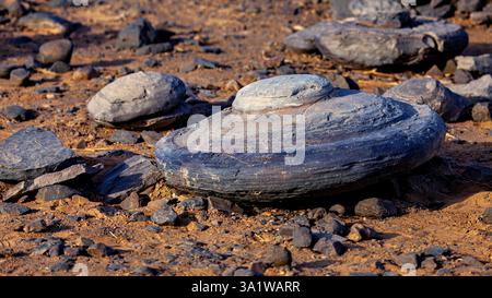 Round lava rocks in the algerian sahara Stock Photo - Alamy