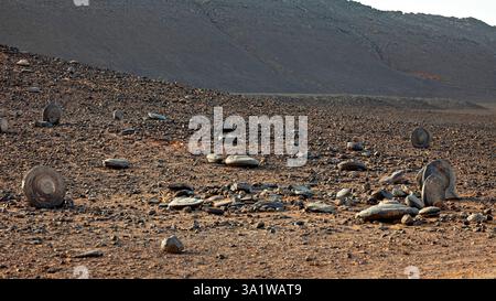 Round lava rocks in the algerian sahara Stock Photo - Alamy
