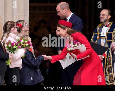 The Princess of Wales is presented with flowers after attending the ...