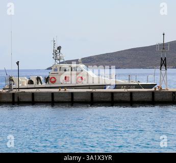 Livadia harbour with Hellenic Coast Guard boat moored, Tilos Island ...