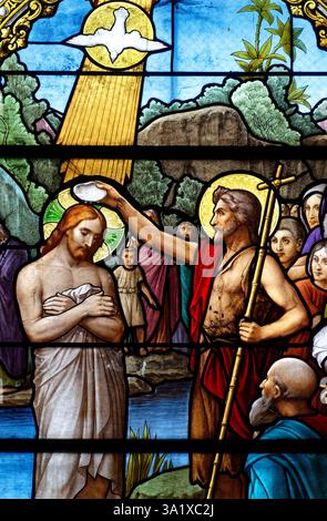 Champlost, FRANCE - 01-29-2025: Stained glass (19th century) of Baptism of Jesus by John the ...