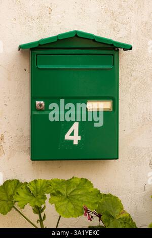 House number 4 (four) on mail box Stock Photo - Alamy
