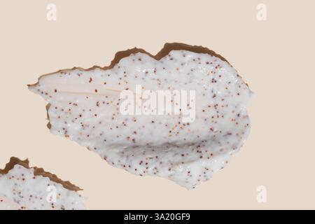 Sample of natural scrub on pastel beige background. Peeling cream with ...