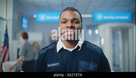 Airport Security Checkpoint: Portrait of African American TSA Worker ...