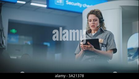 Airport Security System: Female TSA Officer with Tablet Computer ...