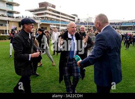 Winner owner Anthony Cooper-Barney (right) celebrates after Jango Baie ...