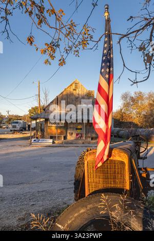 Rosston, Texas, United States. Rusted vintage farm tractor and American ...