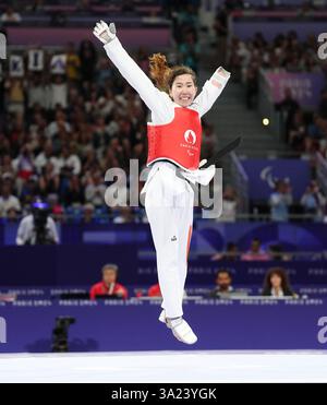 Refugee Paralympic Team's Zakia Khudadadi celebrates victory over ...