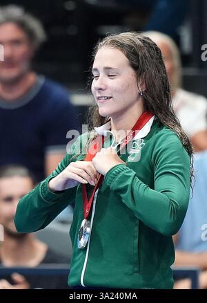 Ireland’s Roisin Ni Riain after winning sliver in the 100m Backstroke ...