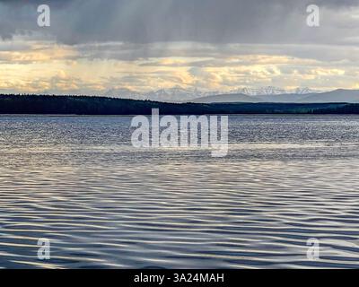 A tranquil mountains scenery under the cloudy sky Stock Photo - Alamy