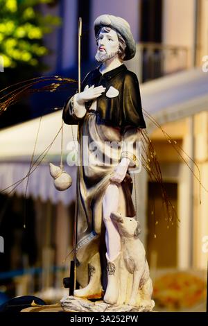 Scilla, ITALY - 11-01-2024: Statue (19th century) of Saint Roch and his ...