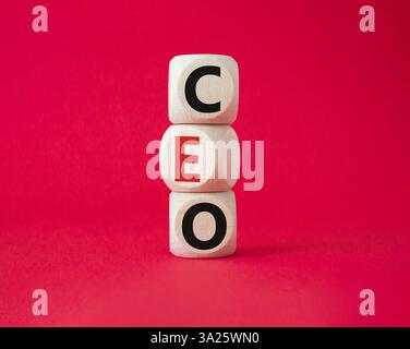CEO - hief executive officer symbol. Concept word CEO on wooden cubes ...